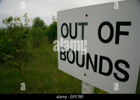 Out of bounds sign on golf course bold white lettering on royal blue ...