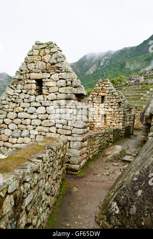 Rocks and stone wall ruins at Machu Picchu.UNESCO world heritage site ...