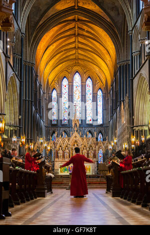 Choirmaster conductor of choir from USA singing / choristers sing ...