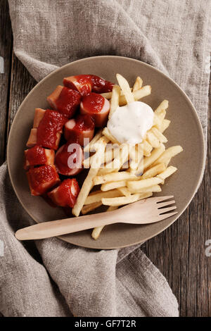 Nutrition, fast food. Curry wurst, a Bratwurst style sausage with a ...