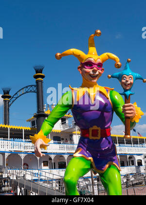 Colourful statue by the Paddle Wheeler Creole Queen in New Orleans ...