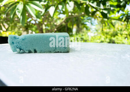 Aqua Sponge cleaning car wash Stock Photo - Alamy