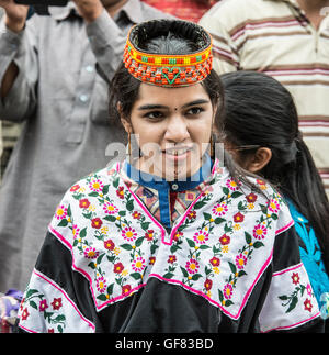 Kalash woman wearing a cowrie shell headdress (shushut) and coloured ...