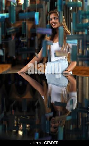 Salisbury Cathedral employee Lottie Pedder looks at the exhibit ...