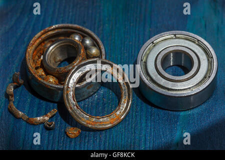 Spoiled collapsed and a new bearing for rollers and scooters Stock ...