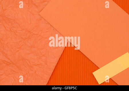 Texture of craft orange color paper background with red and black ...