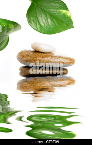Pebble stone reflections on the water. Nature background. Zen ...
