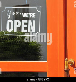 Open sign in street cafe, vertical shot Stock Photo - Alamy