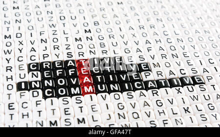acronym of TEAM red and white dices on wood Stock Photo - Alamy