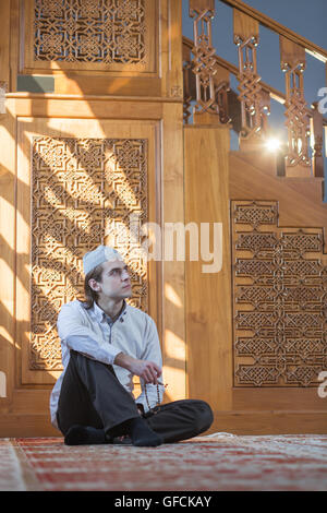 Religious muslim man praying, steps of praying Stock Photo - Alamy