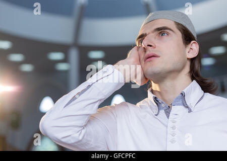 Religious muslim man praying, steps of praying Stock Photo - Alamy