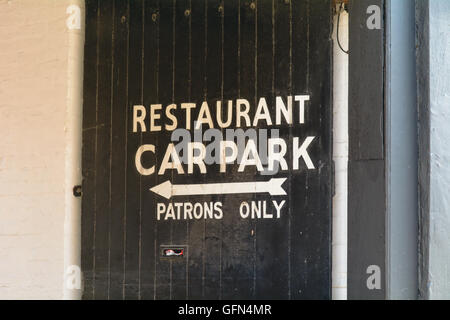 Car Park for Patrons Only sign Stock Photo - Alamy