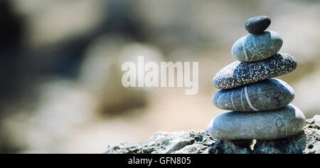 balancing stones with beautiful bokeh Stock Photo - Alamy