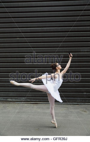 Ballet dancer taking a selfie in the street Stock Photo - Alamy