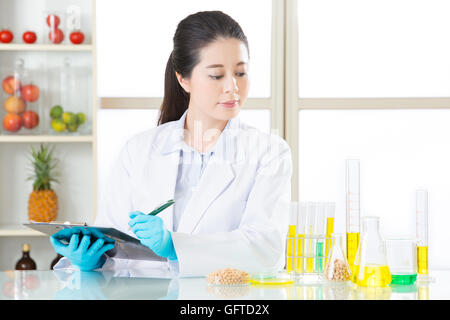 Recording genetic modification data on blank clipboard for test result ...