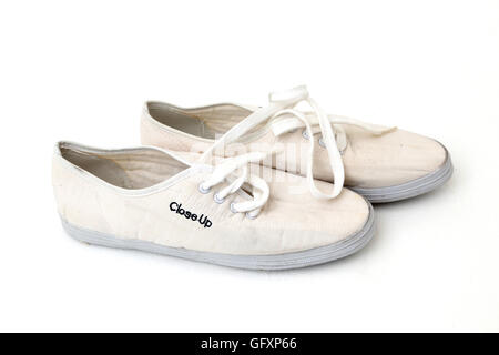 A Pair Of White Close Up Plimsoles Stock Photo - Alamy