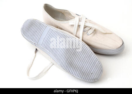 A Pair Of White Close Up Plimsoles Stock Photo - Alamy