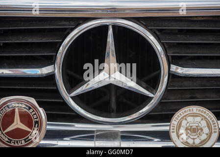 Mercedes car badge Stock Photo - Alamy