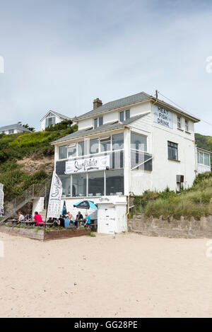 The Surfside beach cafe and restaurant on the beach at Polzeath ...