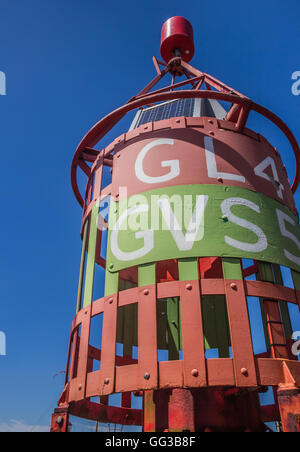 A Green Navigation Buoy with a solar Panel in the Shetland Sound on a ...