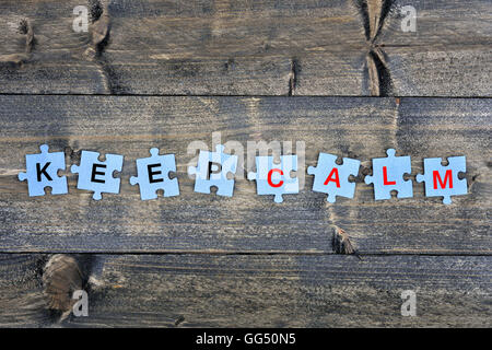 Puzzle pieces with word Keep calm Stock Photo - Alamy