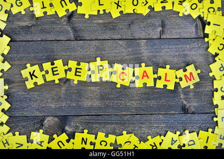 Puzzle pieces with word Keep calm Stock Photo - Alamy