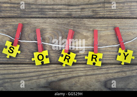 Puzzle pieces with word Sorry Stock Photo - Alamy