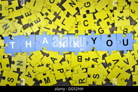 Puzzle pieces with word Thank you Stock Photo - Alamy