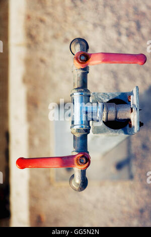 Pipe and closed valve with red handle isolated on white background ...