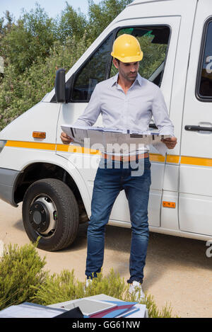 Construction blueprint and plan reading Stock Photo - Alamy