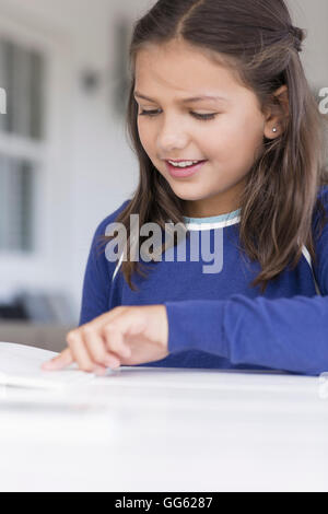 Close up Girl Reading Book Stock Photo - Alamy