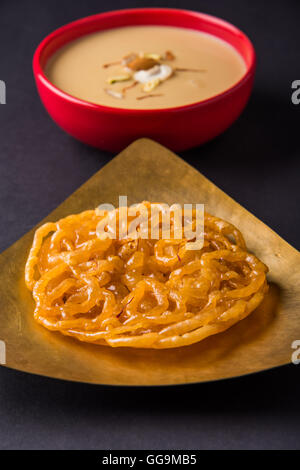 jilbi or jalebi or imarati with rabdi made from condensing milk, famous ...