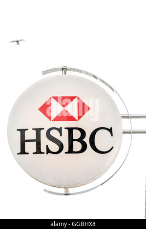 Signage and cheque books with logo from HSBC Bank Stock Photo - Alamy