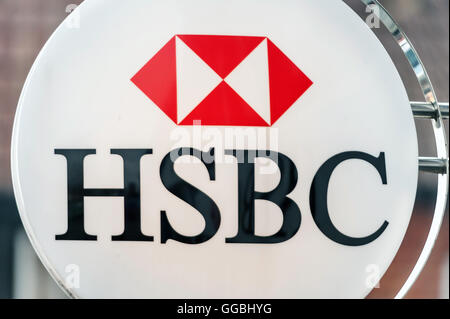 Signage and cheque books with logo from HSBC Bank Stock Photo - Alamy