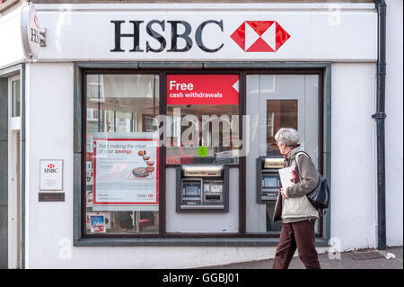 Signage and cheque books with logo from HSBC Bank Stock Photo - Alamy