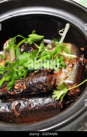 Braised pompano fish Stock Photo - Alamy