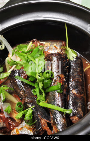 Braised pompano fish Stock Photo - Alamy