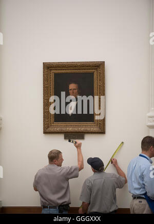 Workers moving all 51 portraits of former Texas governors to make room ...