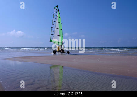 Person sailing in a long thin boat on the sea Stock Photo - Alamy