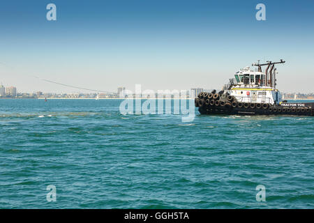 The JOHN QUIGG, Tractor Tug, Maneuvers The CMA CGM Centaurus Into The ...