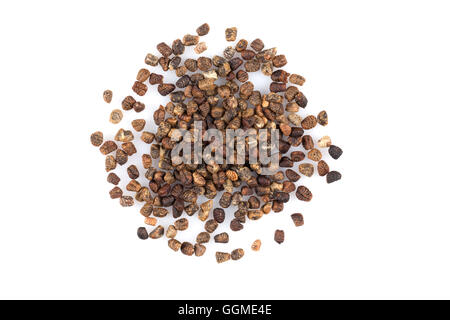 Decorticated cardamom seeds pile on a white background Stock Photo - Alamy