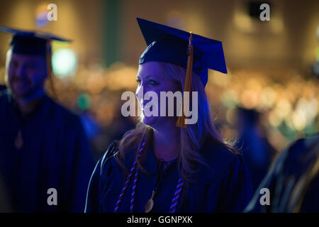 Graduation candidates in caps and gowns wait for Western Governors ...