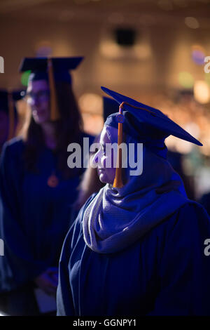 Graduation candidates in caps and gowns wait for Western Governors ...