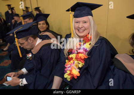 Graduation candidates in caps and gowns wait for Western Governors ...
