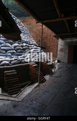 Sand bagged bunkers protecting black powder storage sheds at the Sunny ...