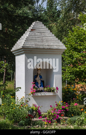 Flowers and candles on a colorful polish cemetery. Autumn, preparations ...