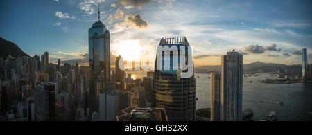 Evening view across Victoria Harbour to skyscrapers on Hong Kong Island ...