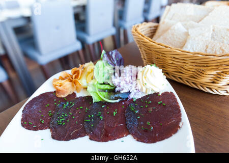 Traditional cold smoked Minke whale meat at Fiskekrogen restaurant ...