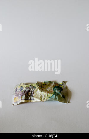 A crumpled paper five pound note of UK currency Stock Photo - Alamy