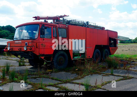 Royal Air Force crash tender in front of airfield control tower Stock ...